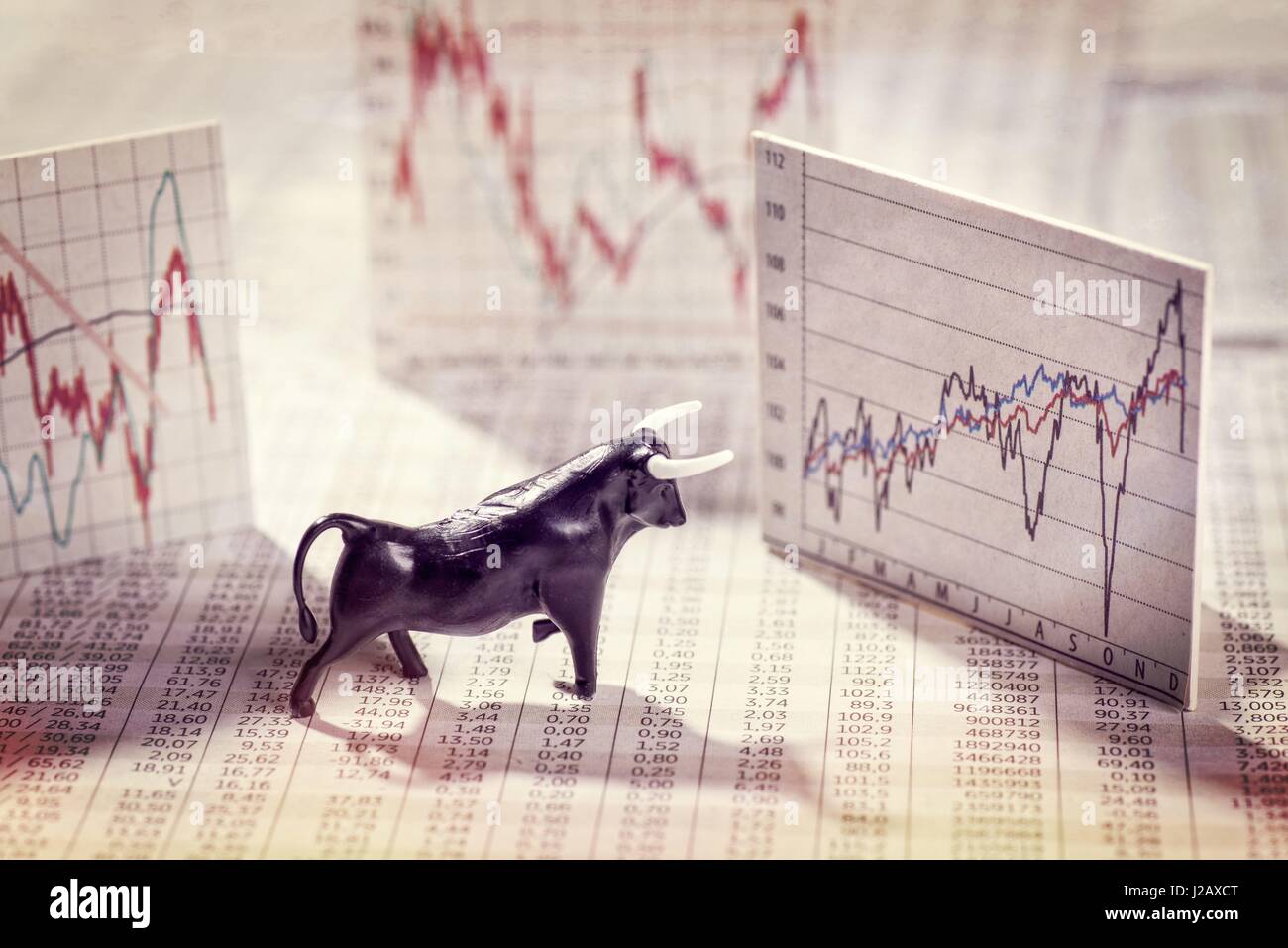 Figure of a bull with quote and charts | usage worldwide Stock Photo ...