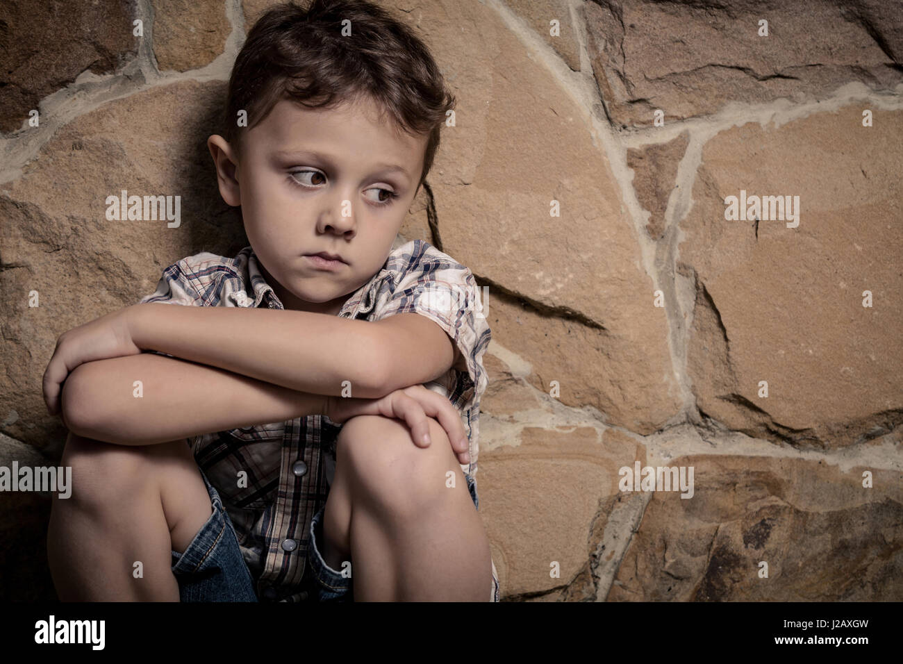 sad little boy Stock Photo - Alamy