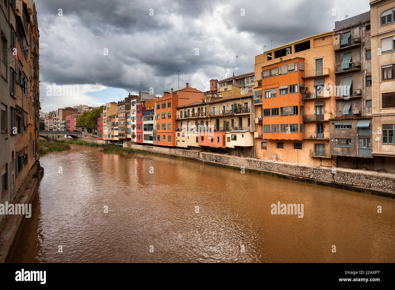 City of Girona in Spain, traditional houses at River Onyar waterfront ...