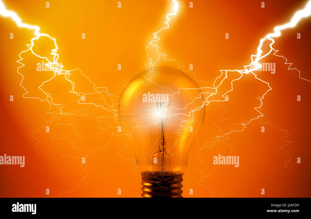an electric bulb light hit by several lighting Stock Photo - Alamy