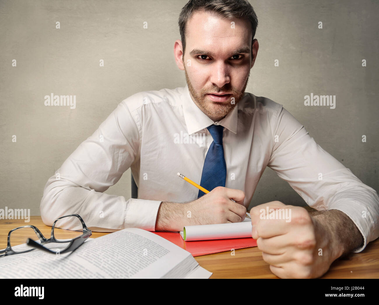 Young businessman taking notes Stock Photo - Alamy