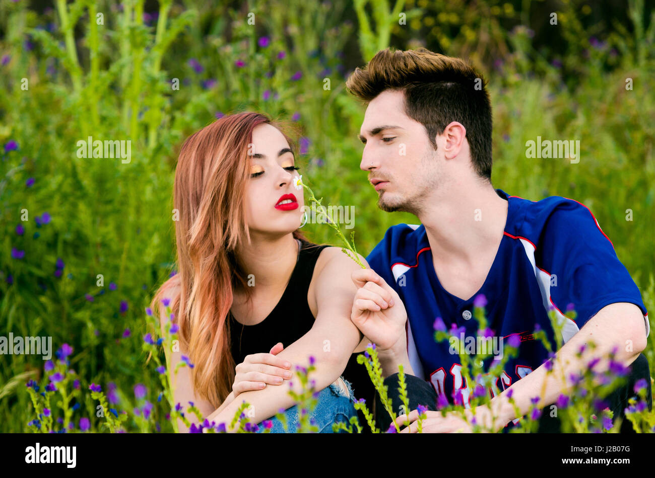 Romantic Couple In Flower Garden