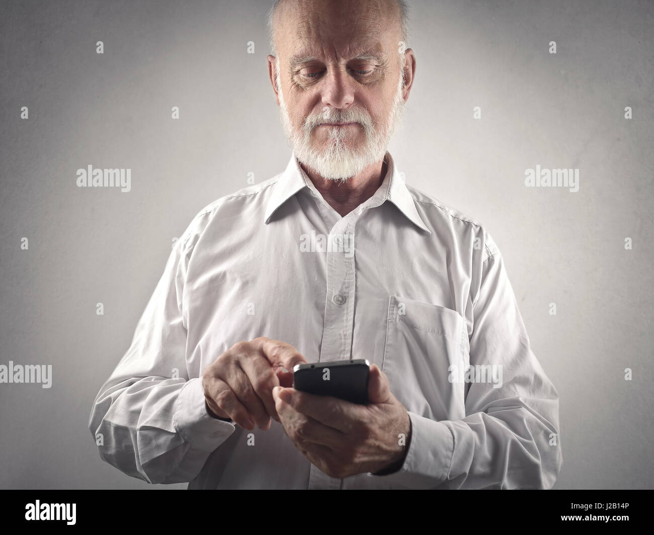 Old man using mobile Stock Photo - Alamy