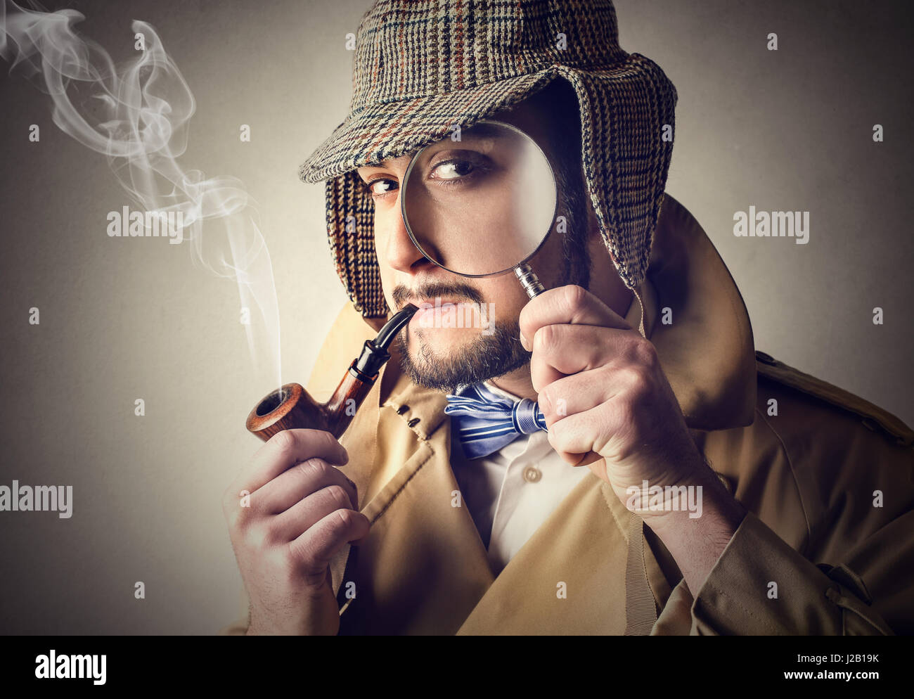Magnifying glass man hat hi-res stock photography and images - Alamy
