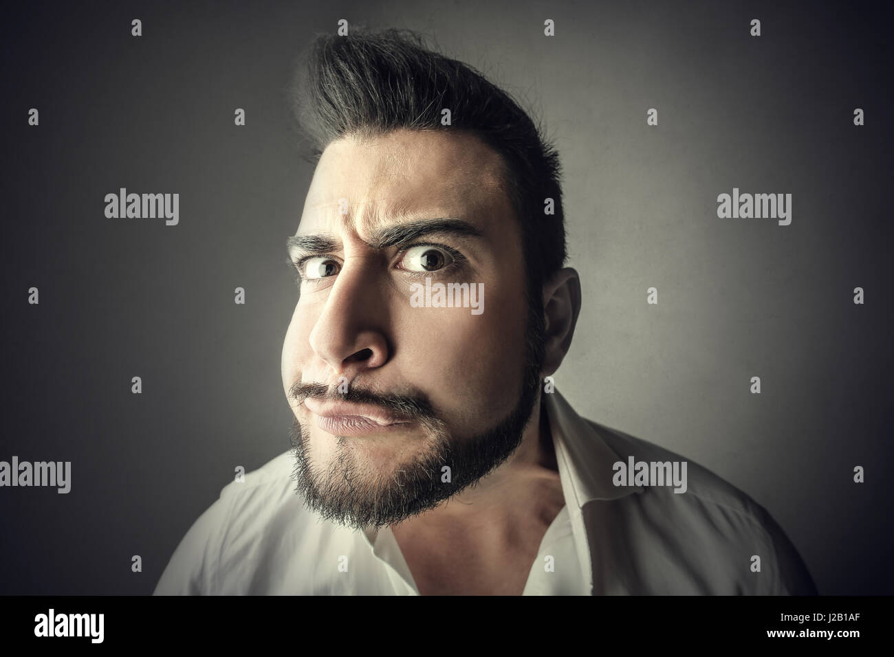 Portrait of doubtful man Stock Photo - Alamy