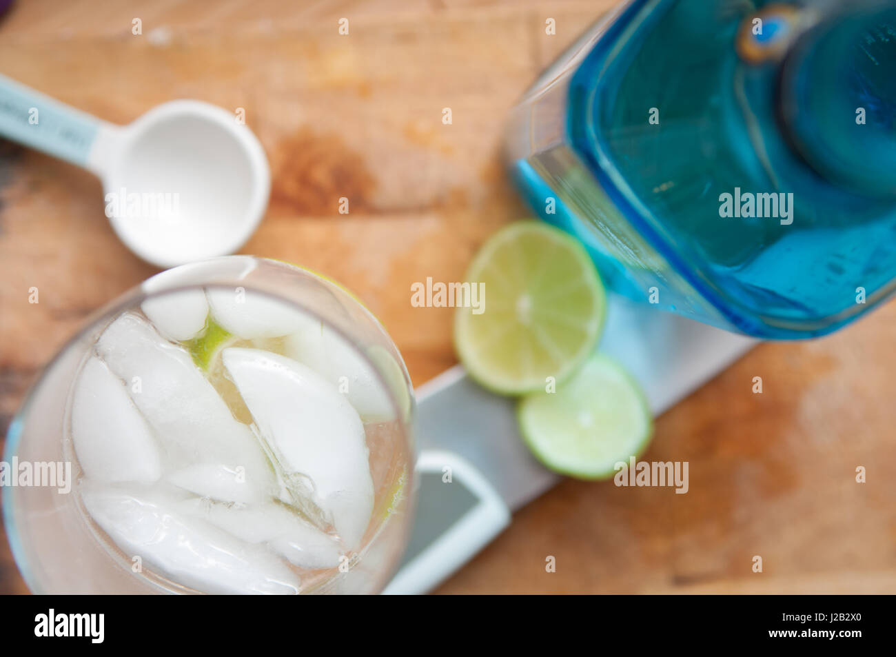 Alcoholic drinks with gin and tonic on a wood table background Stock ...