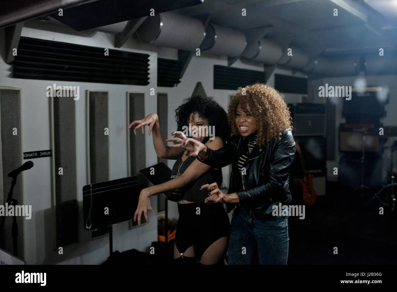 Young woman playfully posing Stock Photo - Alamy Young woman playfully posing Stock Photo - Alamy