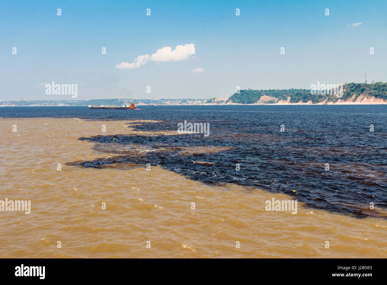 Different colors waters, from the rivers Negro and Solimoes, mingling ...