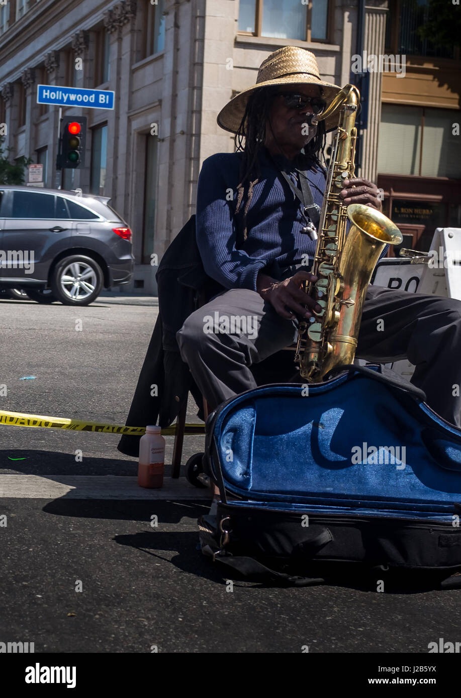 Saxophone busker hi-res stock photography and images - Alamy