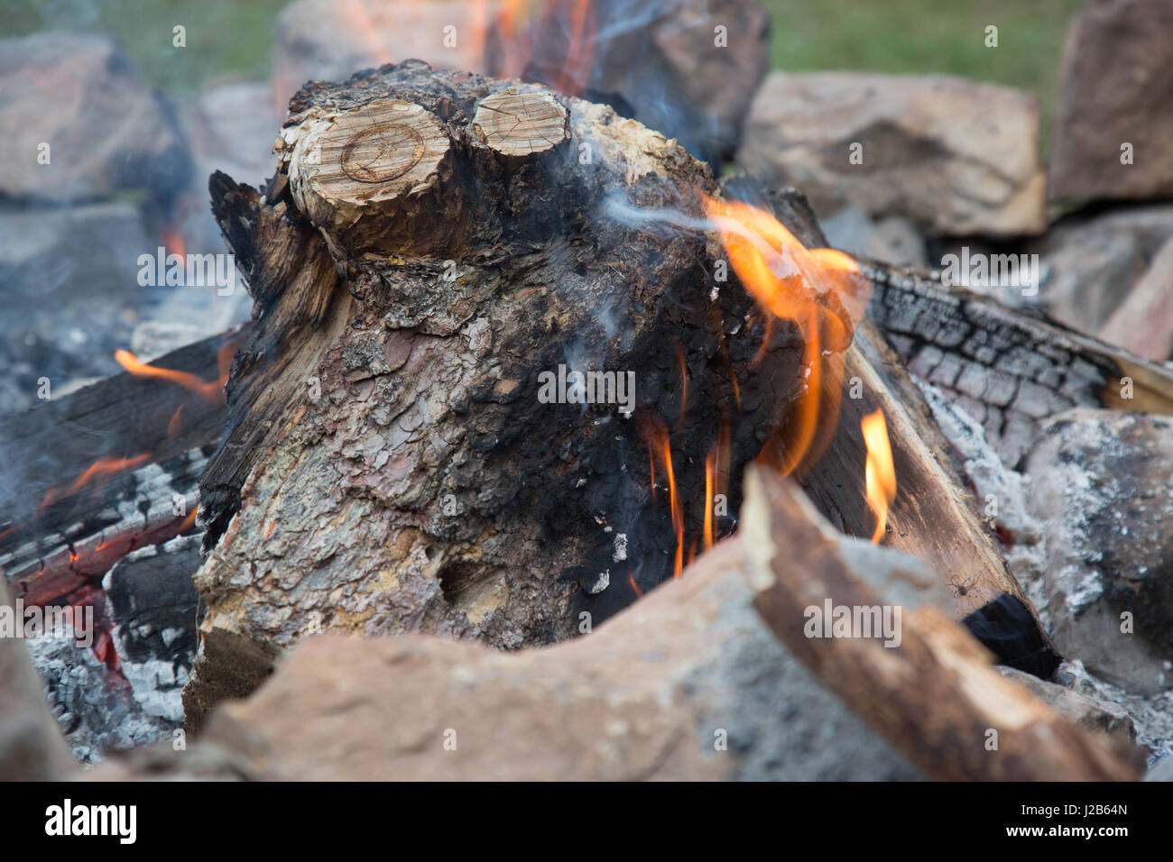 Warm up by the fire Stock Photo - Alamy