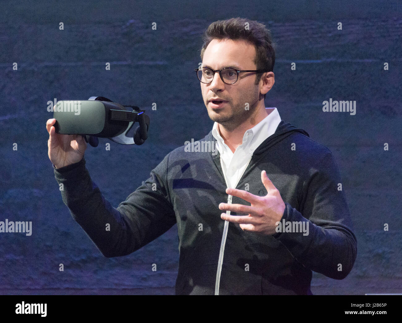 Oculus CEO Brendan Iribe holds the Oculus Rift consumer version Virtual ...