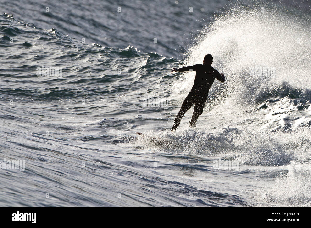 Wave curl surfer hi-res stock photography and images - Alamy