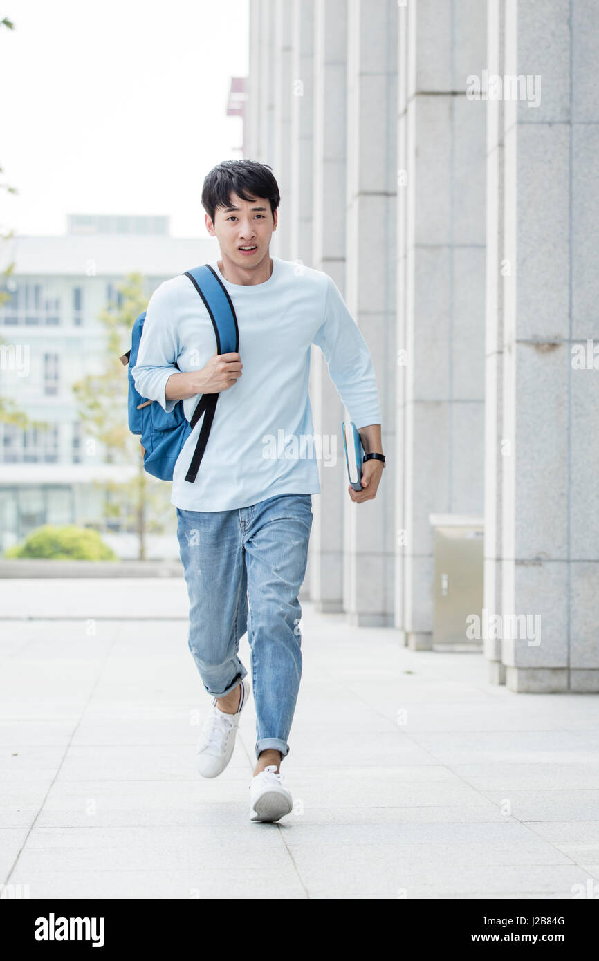 Student running hi-res stock photography and images - Alamy