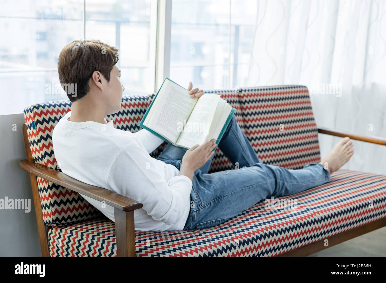 Resting reading hi-res stock photography and images - Alamy