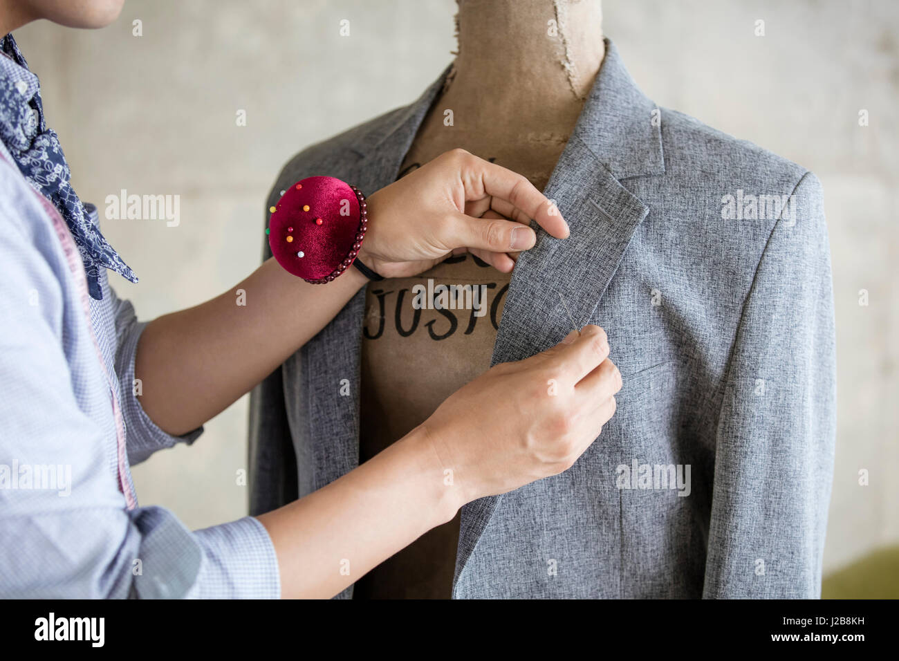 Fashion designer making clothes Stock Photo - Alamy