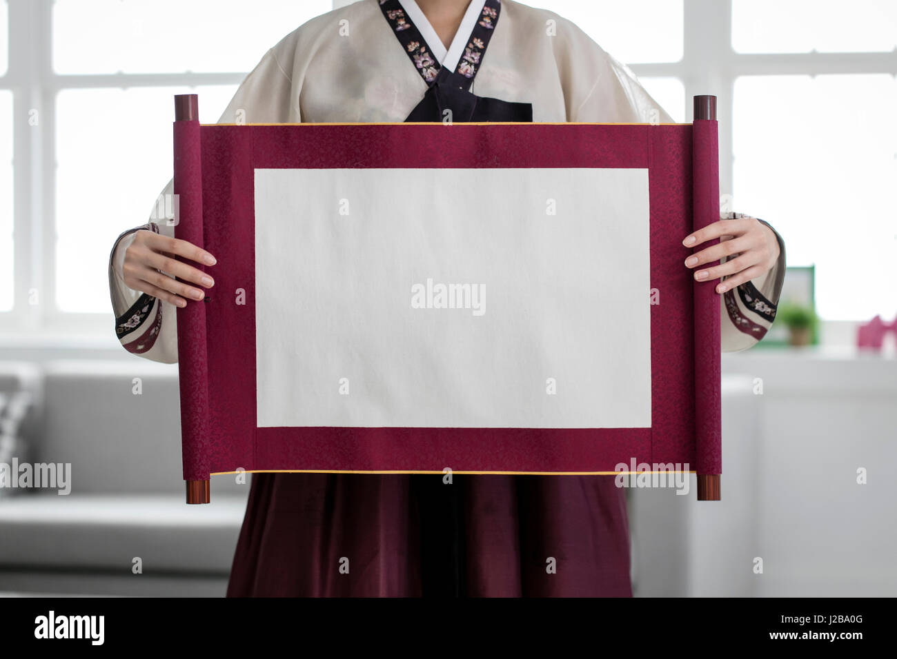 Korean woman showing scroll Stock Photo - Alamy