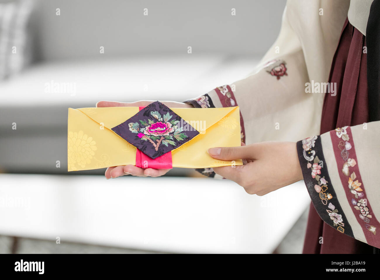 Korean woman with traditional envelope Stock Photo - Alamy