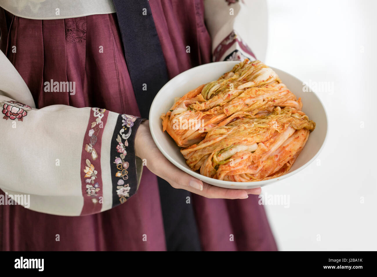 Korean woman with gimchi Stock Photo - Alamy