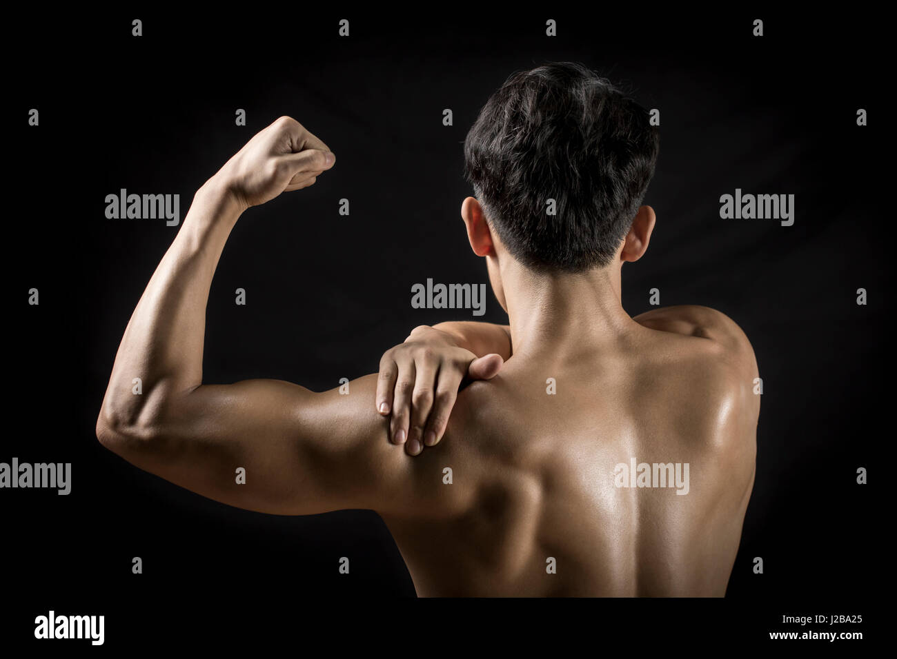Back portrait of healthy muscular man Stock Photo - Alamy