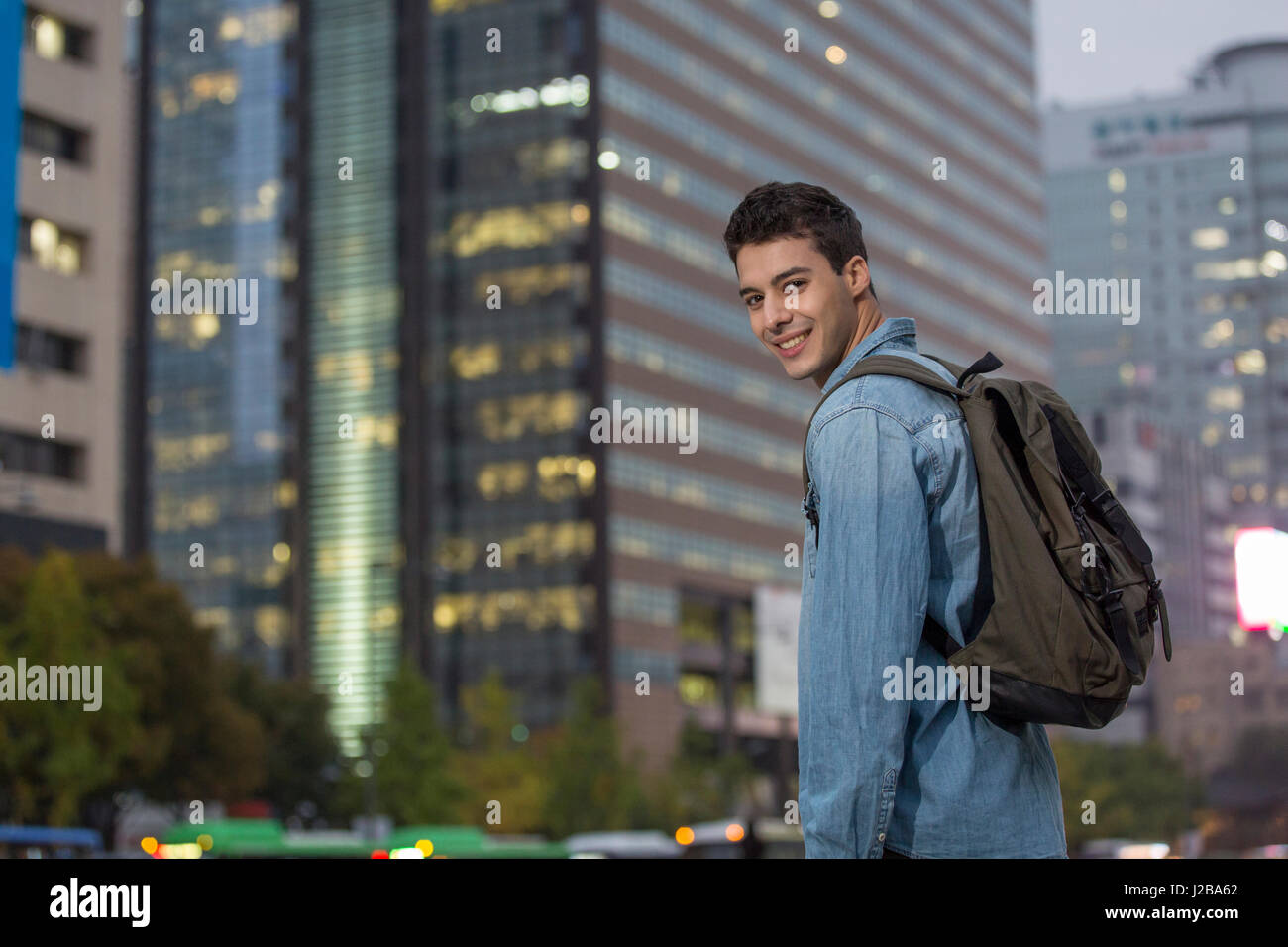 Young smiling.male backpacker in Seoul Stock Photo - Alamy