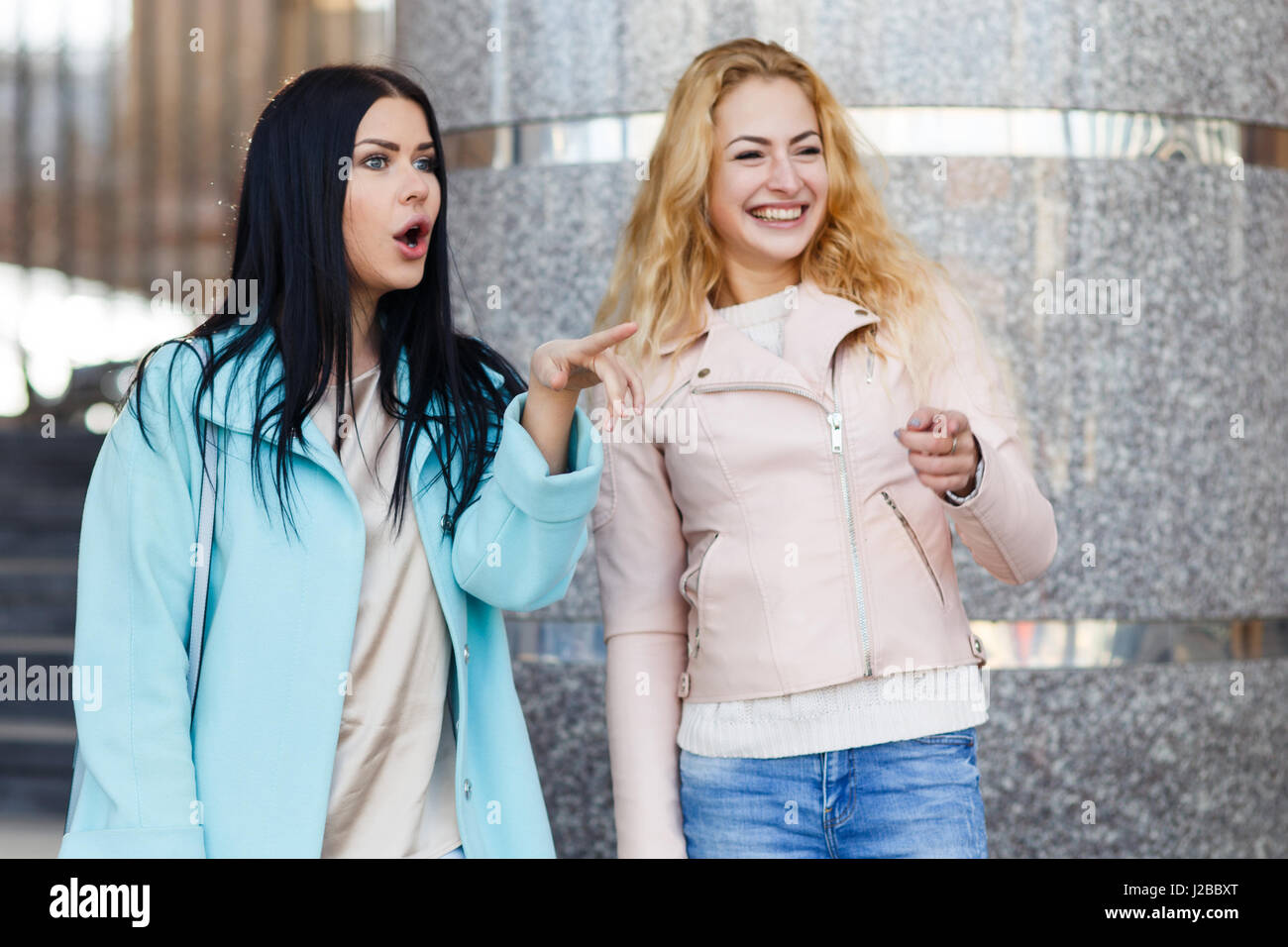 Two cheerful girls one long hi-res stock photography and images - Alamy