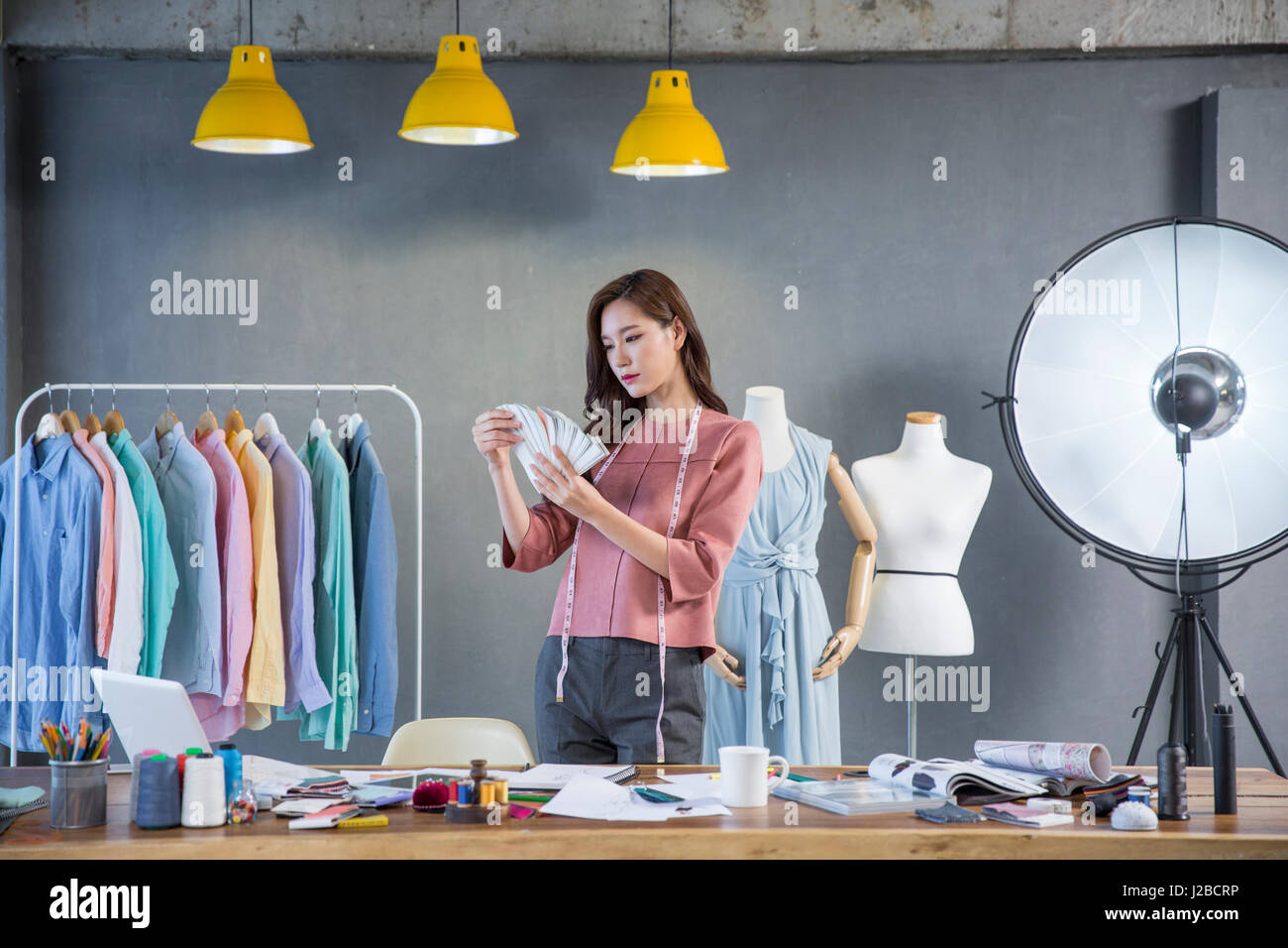 Female fashion designer Stock Photo - Alamy