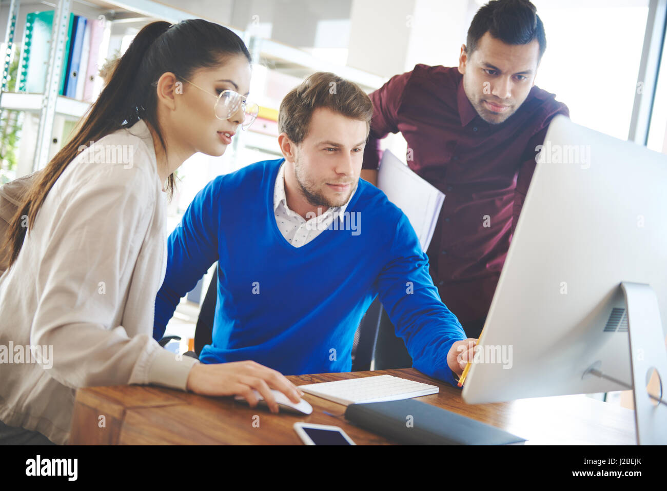 Group of people working with technology Stock Photo - Alamy