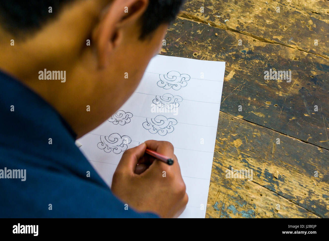 Talented artist drawing, Thimphu, Bhutan Stock Photo - Alamy