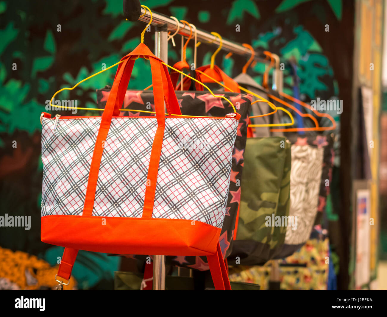 Colorful Purse Bags Hanging on Display Stock Photo - Alamy