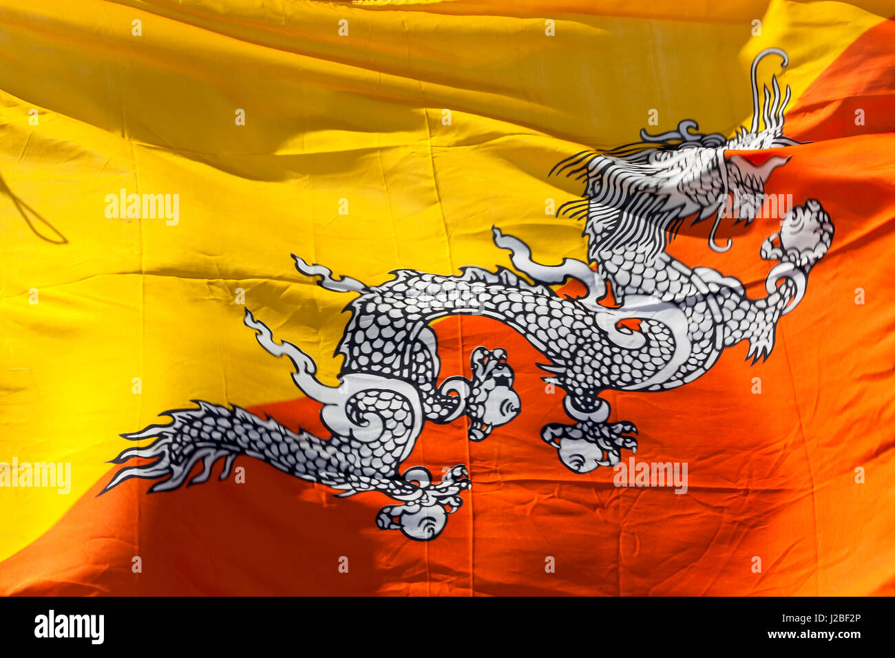 National Flag of Bhutan Stock Photo - Alamy