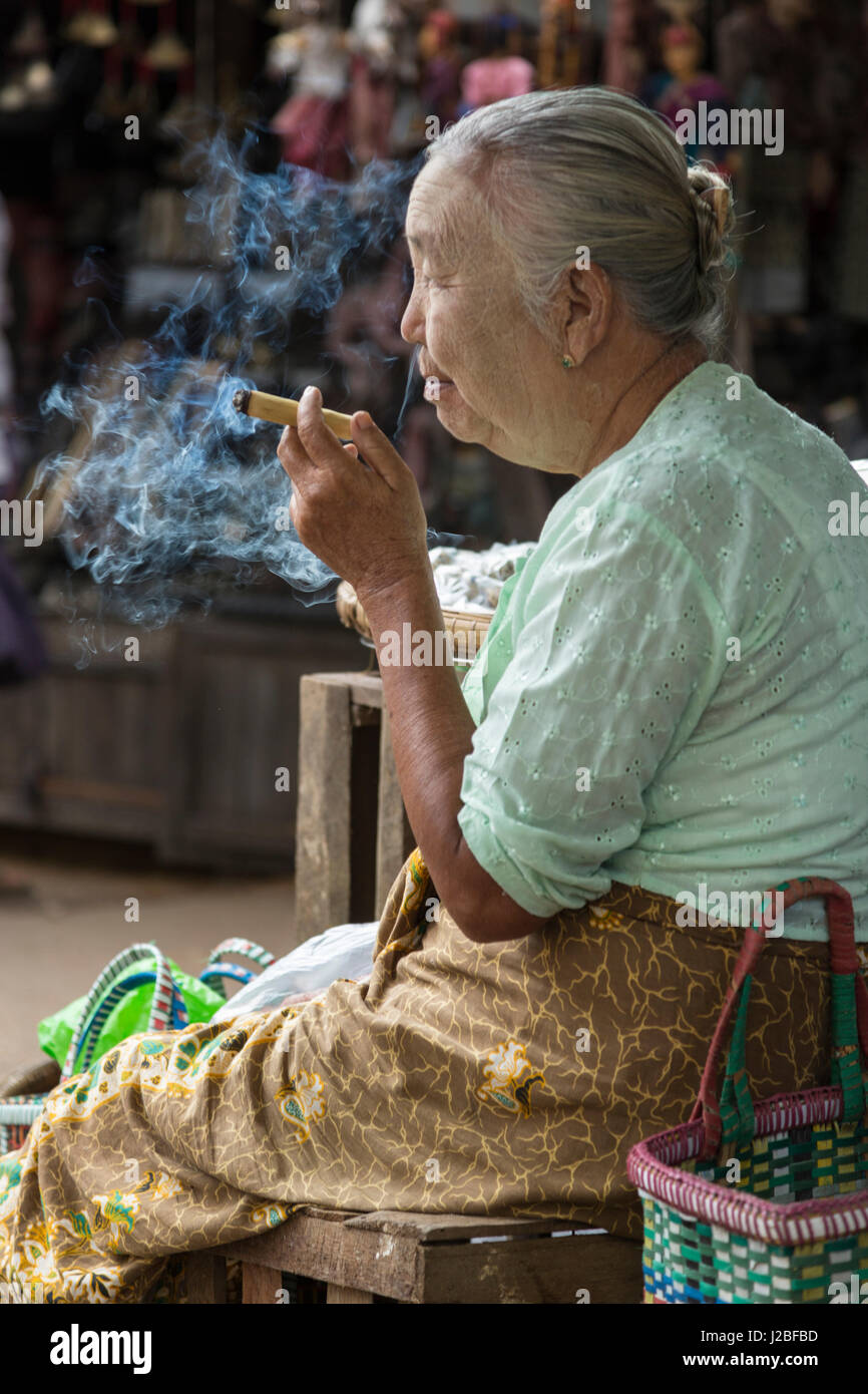 Burmese woman smoking a cheroot (cigar) Myanmar (Burma Stock Photo - Alamy