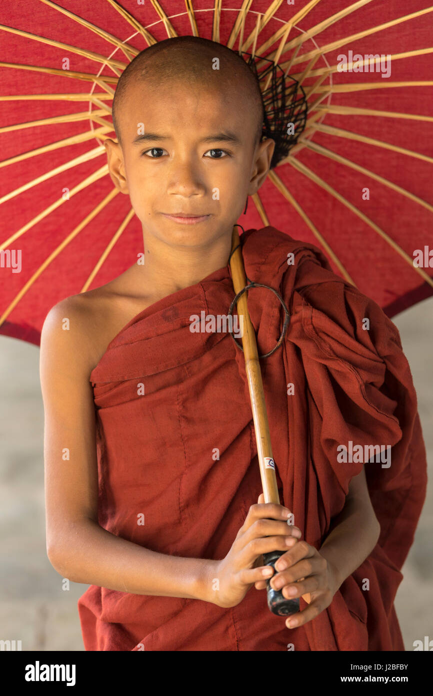 Myanmar, Bagan. Young monk in the hallway of Shwezigon monastery Stock ...