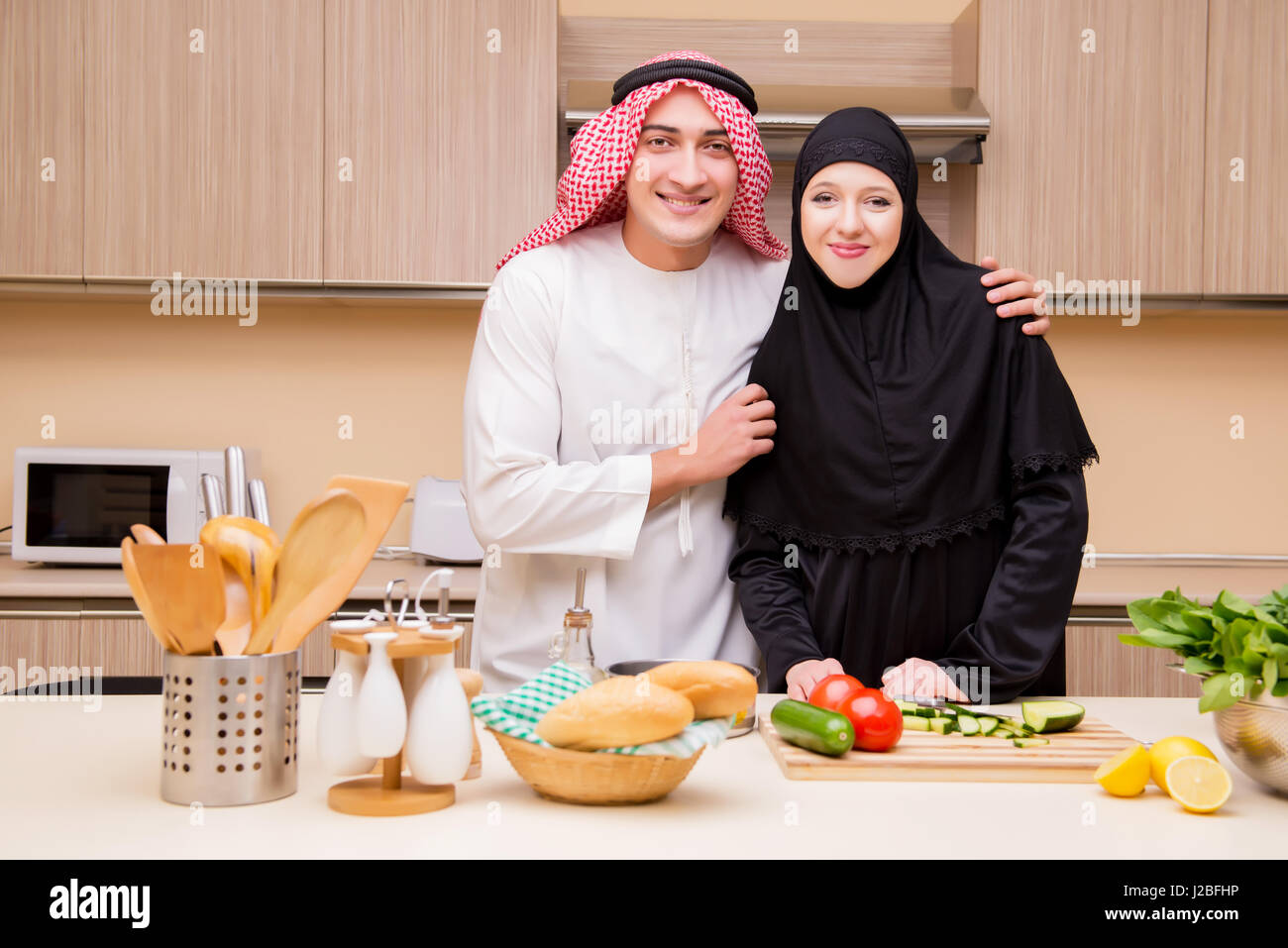 Arabic woman cutting vegetables hi-res stock photography and images - Alamy