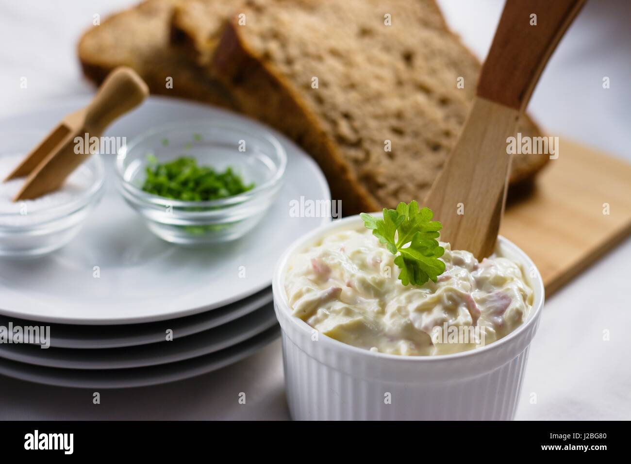 Cottage cheese spread in a bowl served and ready to eat with slices of ...