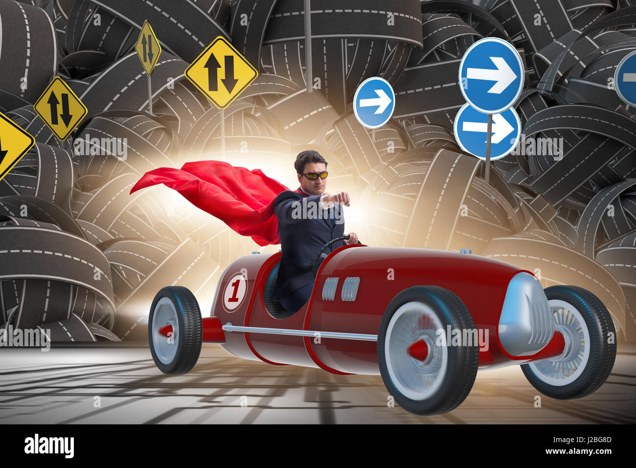 Superhero businessman driving vintage roadster Stock Photo - Alamy