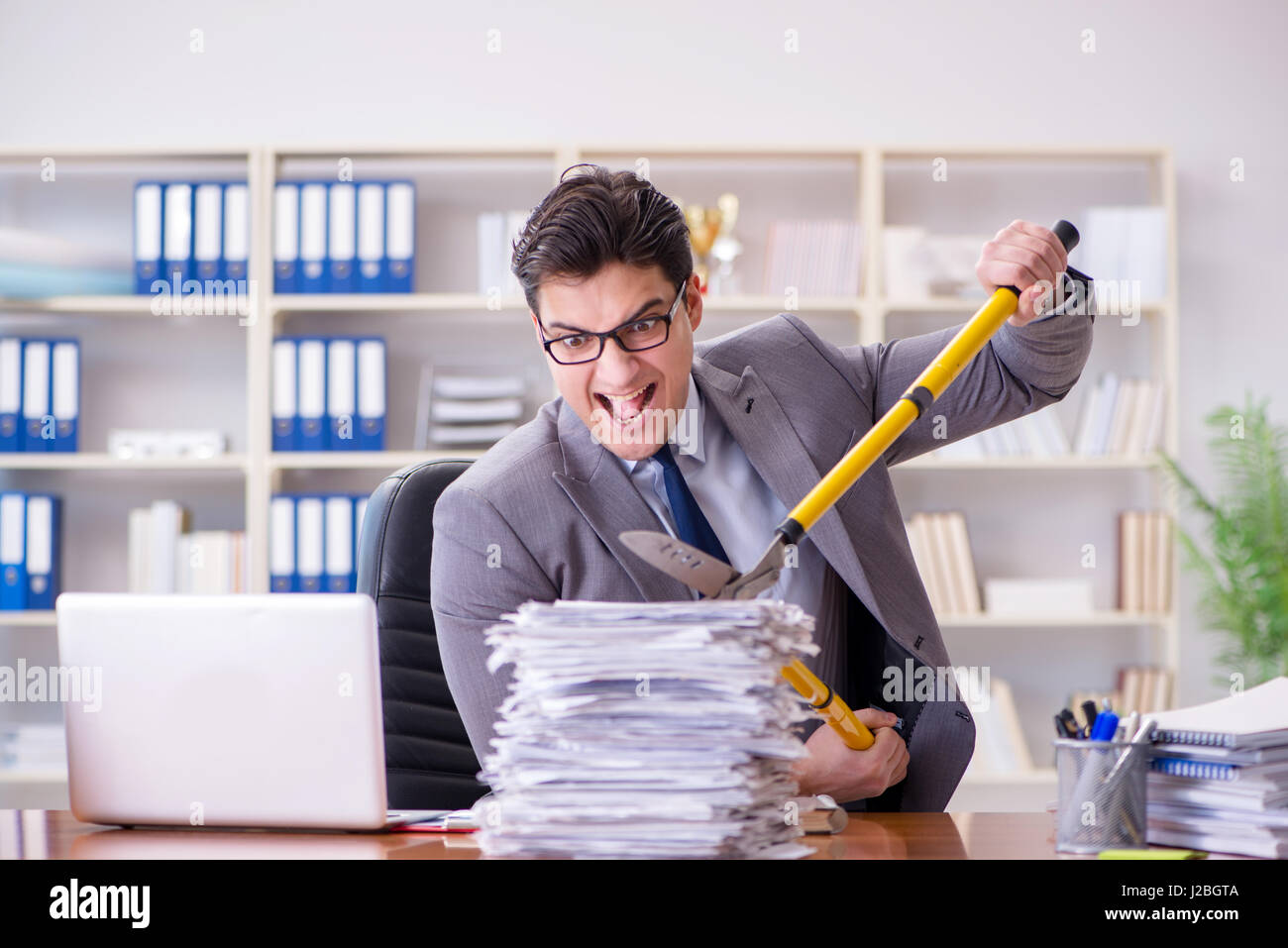 Angry aggressive businessman in the office Stock Photo - Alamy