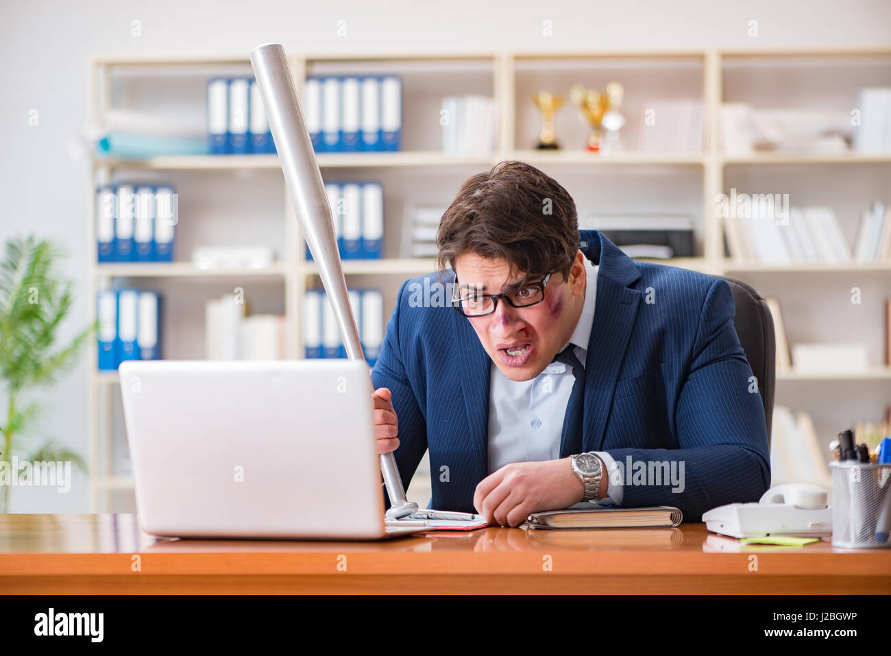 Angry aggressive businessman in the office Stock Photo - Alamy
