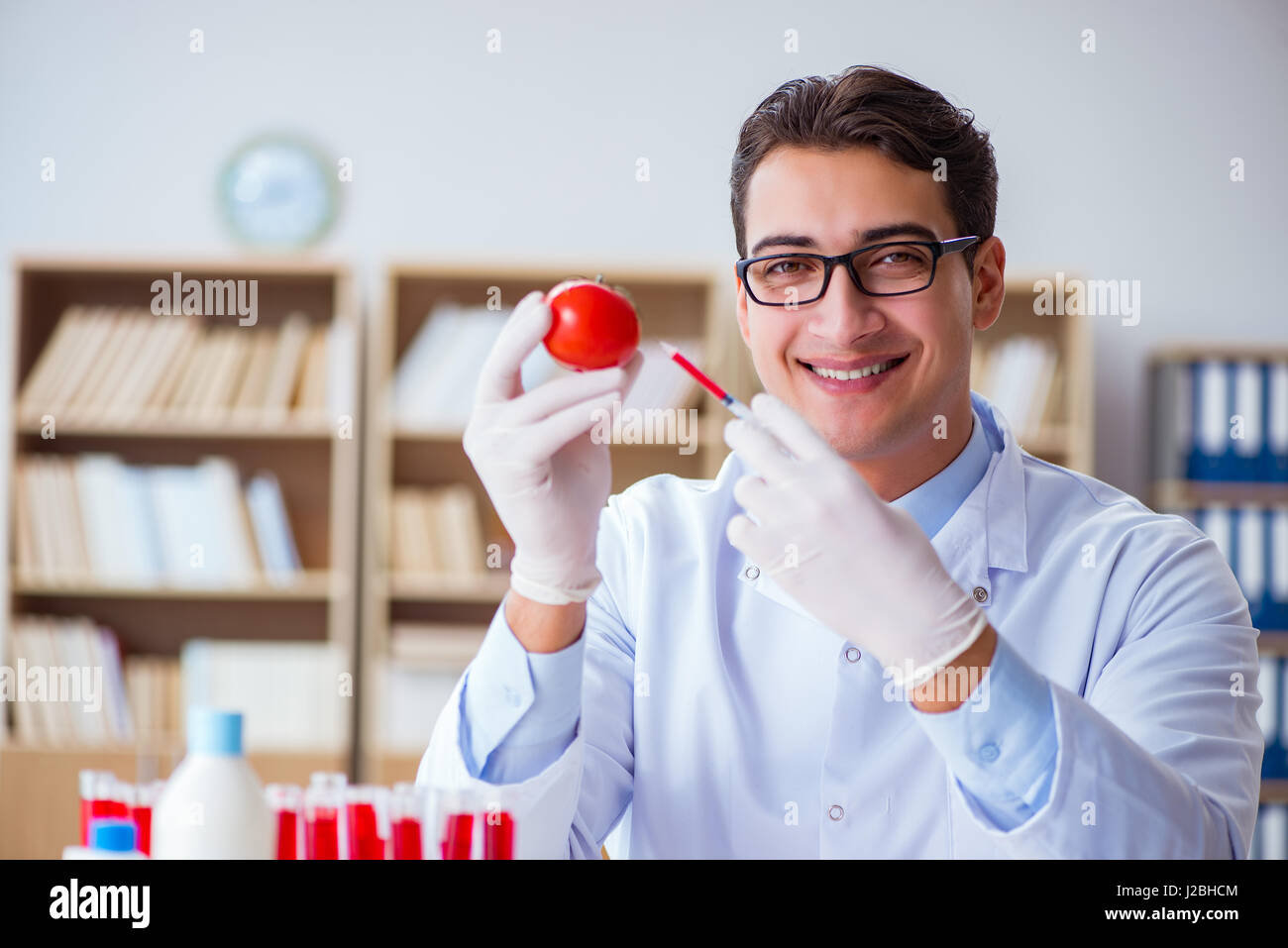 Scientist working on organic fruits and vegetables Stock Photo - Alamy