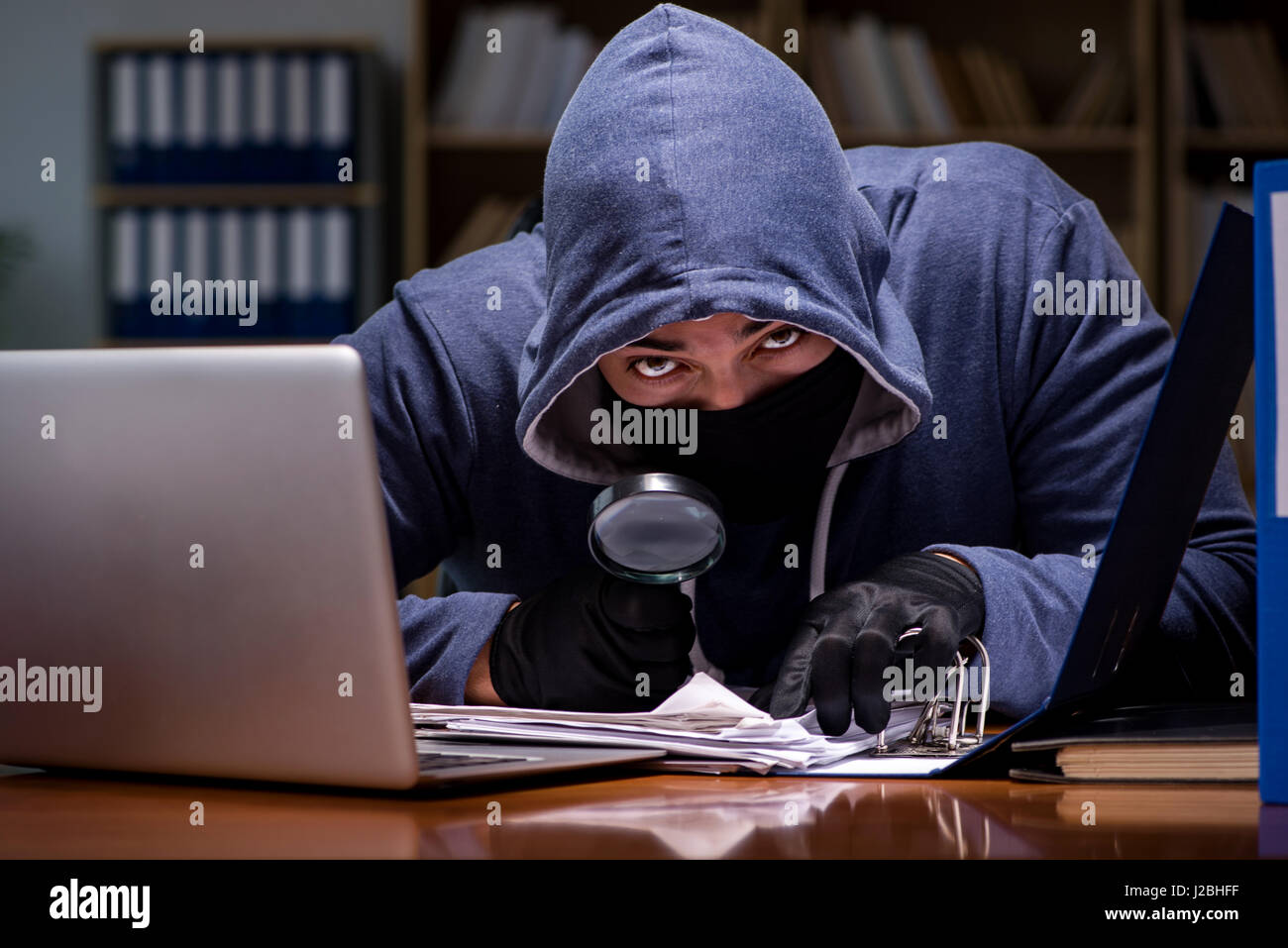 Hacker stealing personal data from home computer Stock Photo - Alamy