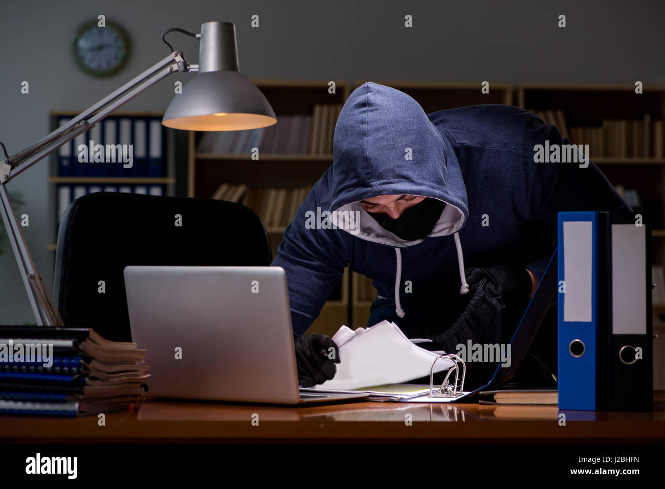 Hacker stealing personal data from home computer Stock Photo - Alamy