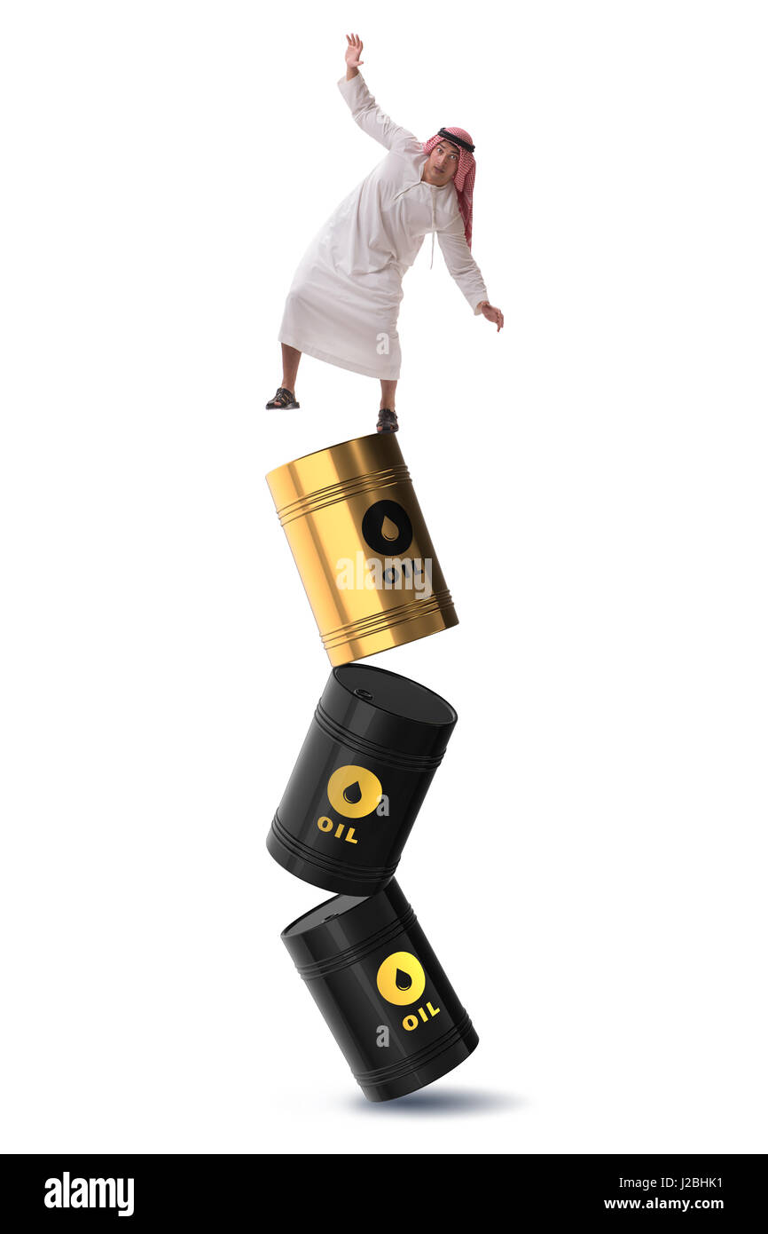 Arab businessman losing balance on oil barrels Stock Photo - Alamy