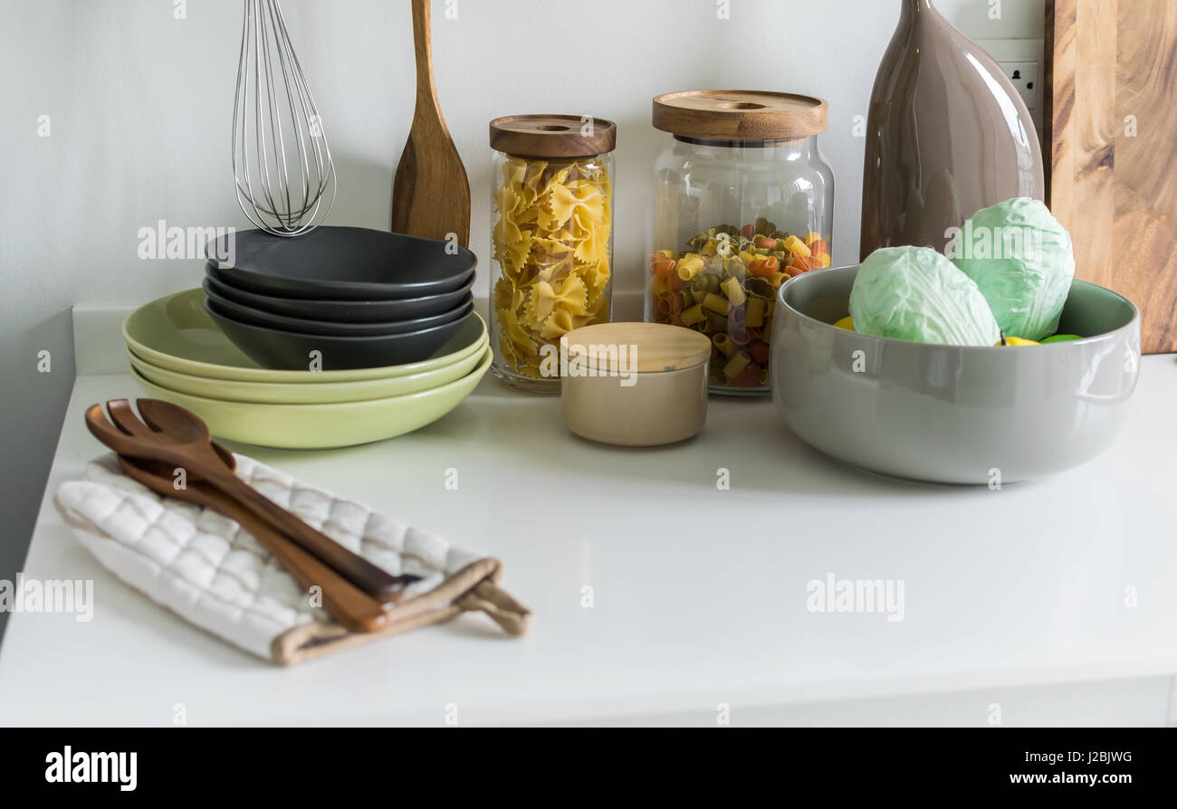 modern white pantry with utensil in kitchen Stock Photo - Alamy