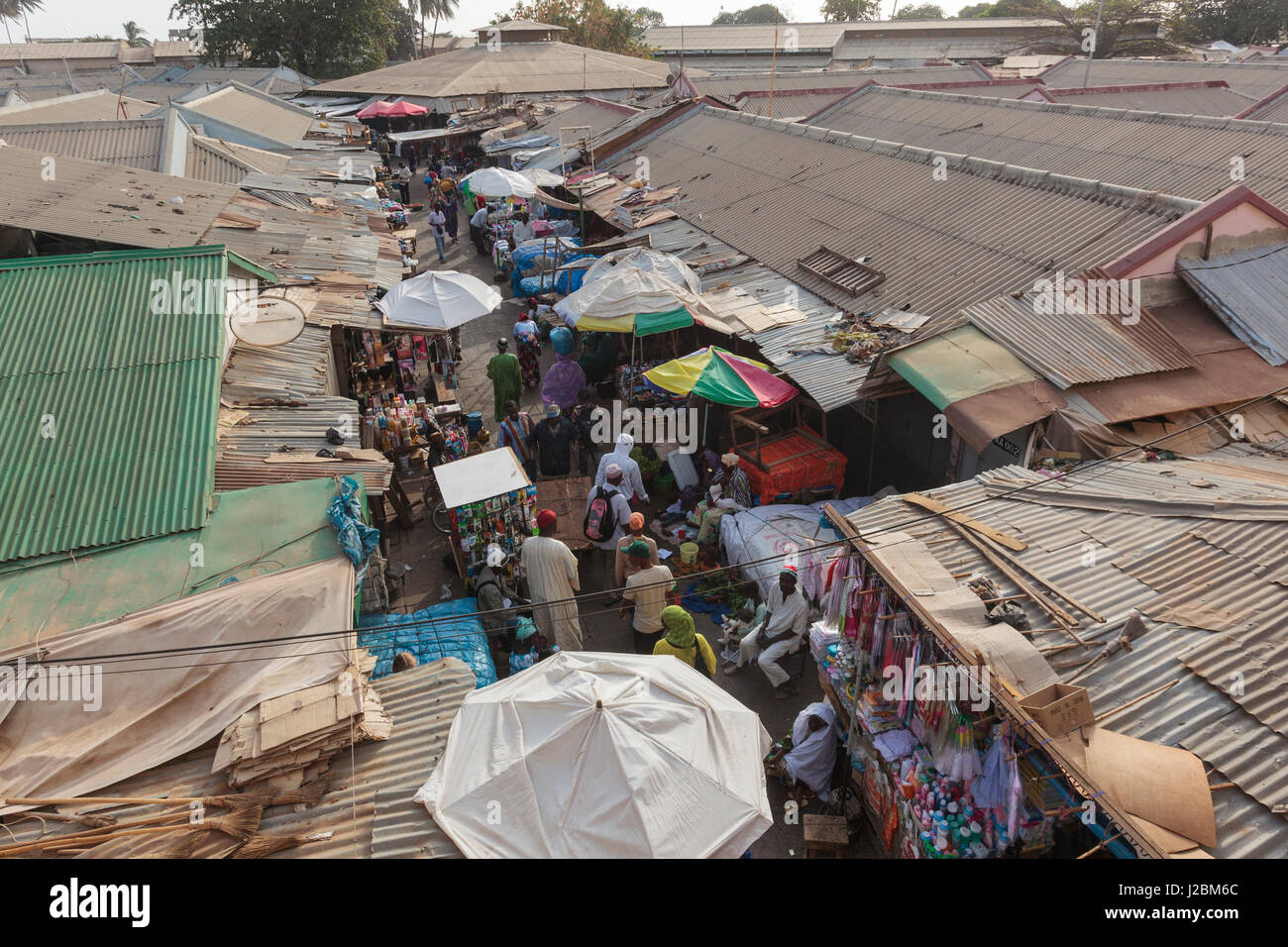 Africa, Gambia, Serrekunda. An overhead view of a busy public market ...