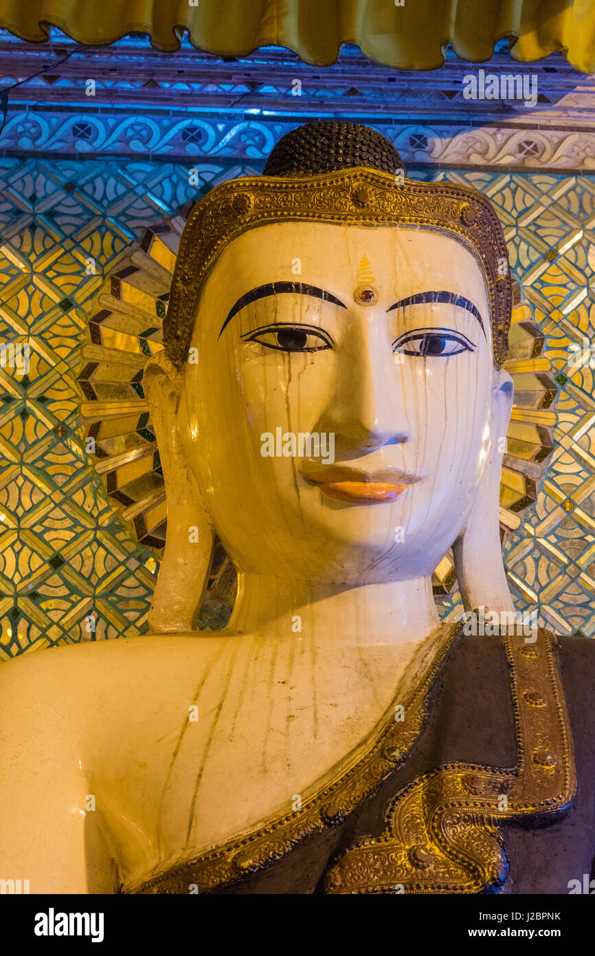 Myanmar. Yangon. Shwedagon Pagoda. Rainwater leaves streaks on the face ...