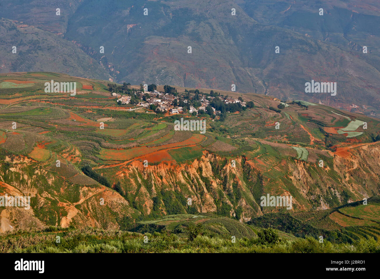 Town below in red lands dongchuan hi-res stock photography and images ...