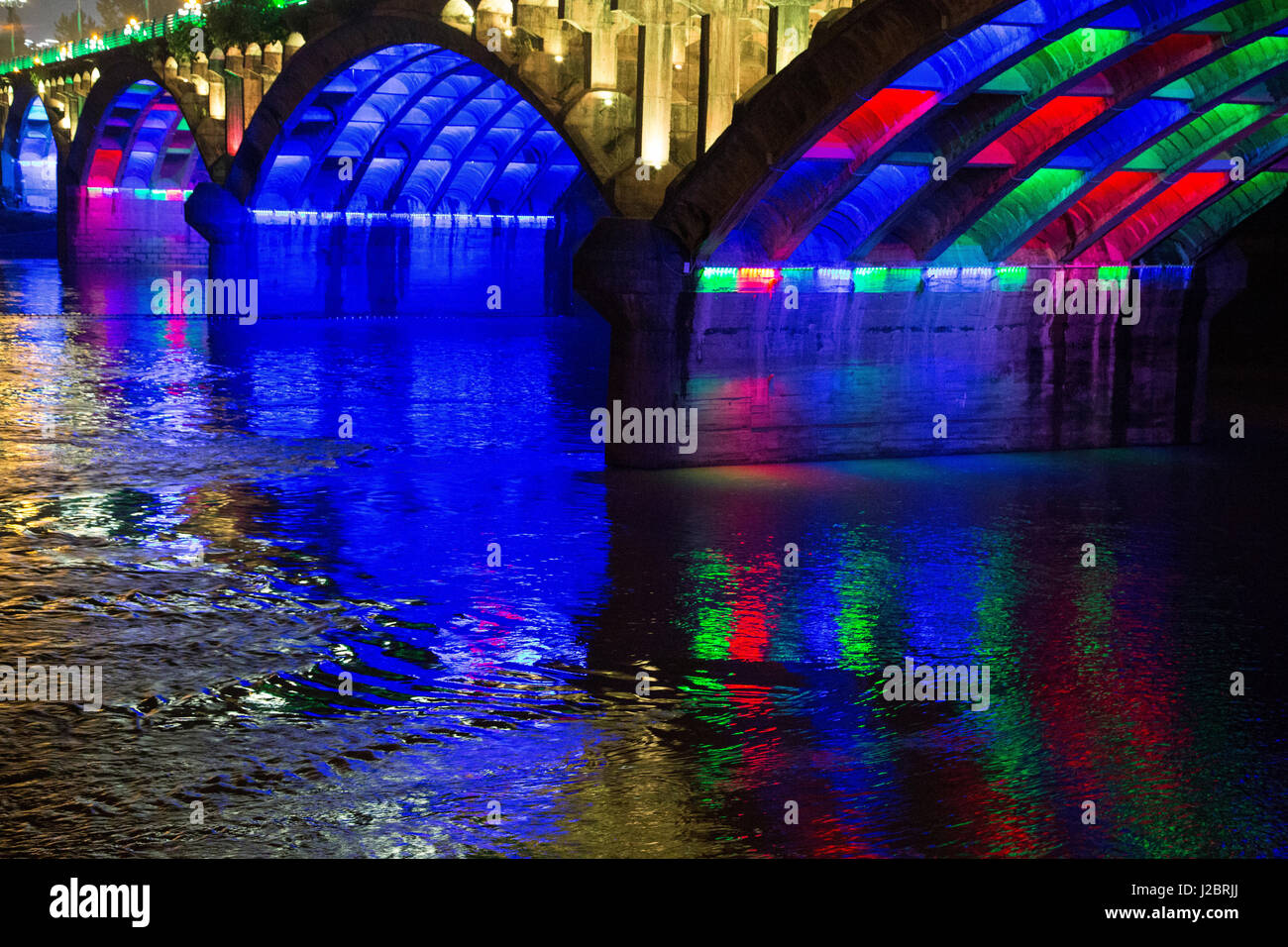 Modern bridge with multicolored lighting at night, Huangshan, China ...