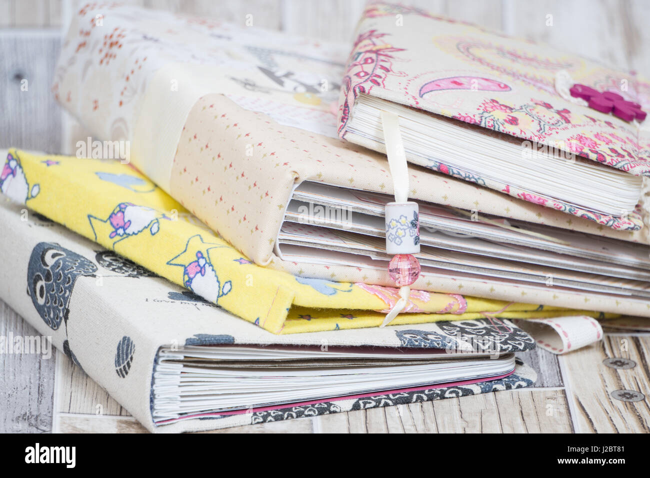 Notebooks, planners and photo albums in scrapbooking style with ...