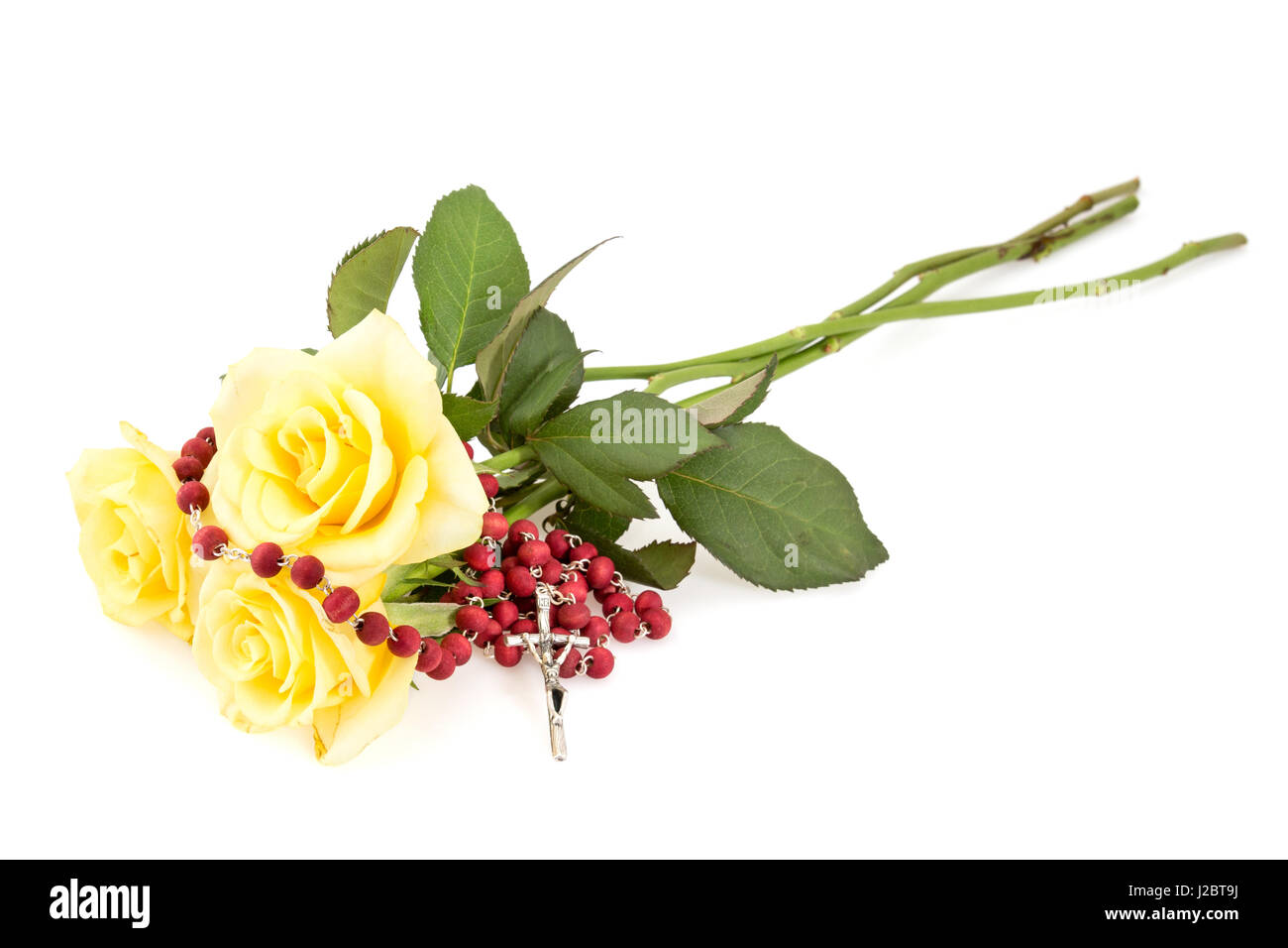 Rosary and yellow roses,isolated on white background Stock Photo - Alamy