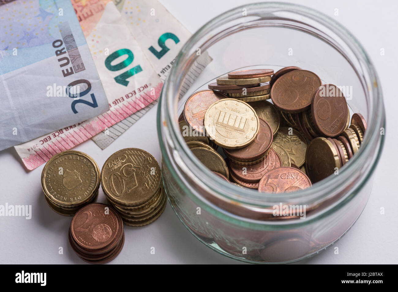 Saving euro money Stock Photo - Alamy