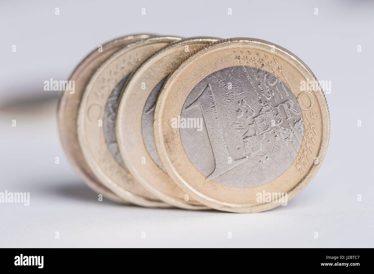 used 1 euro coins Stock Photo - Alamy